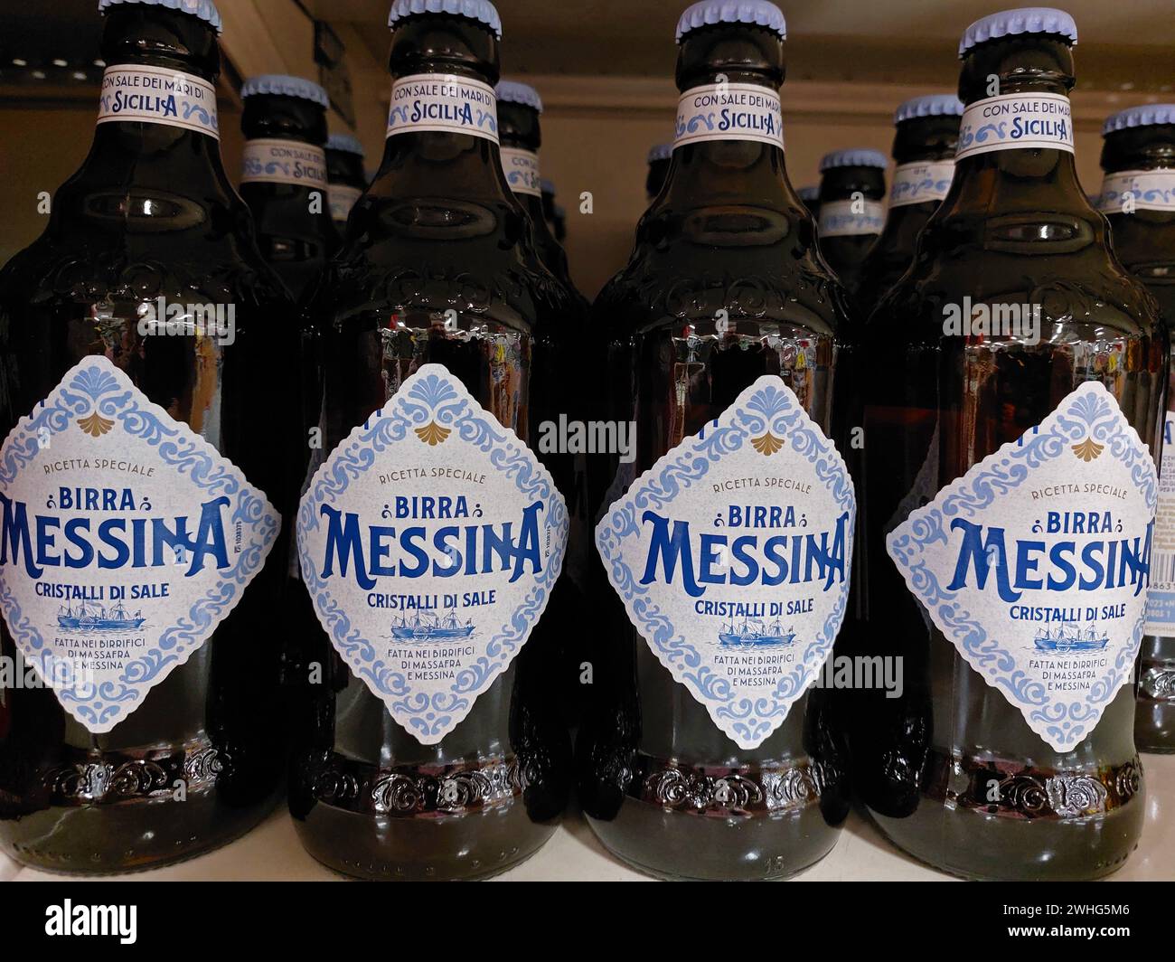 Italian Messina beer bottles in a supermarket Stock Photo - Alamy