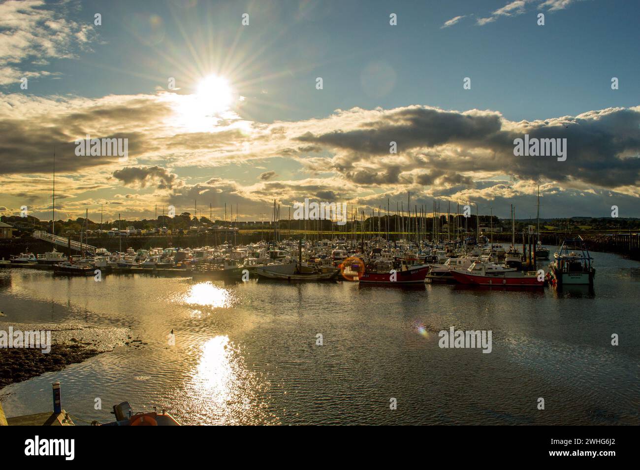 Sunset over Amble Marina Stock Photo - Alamy