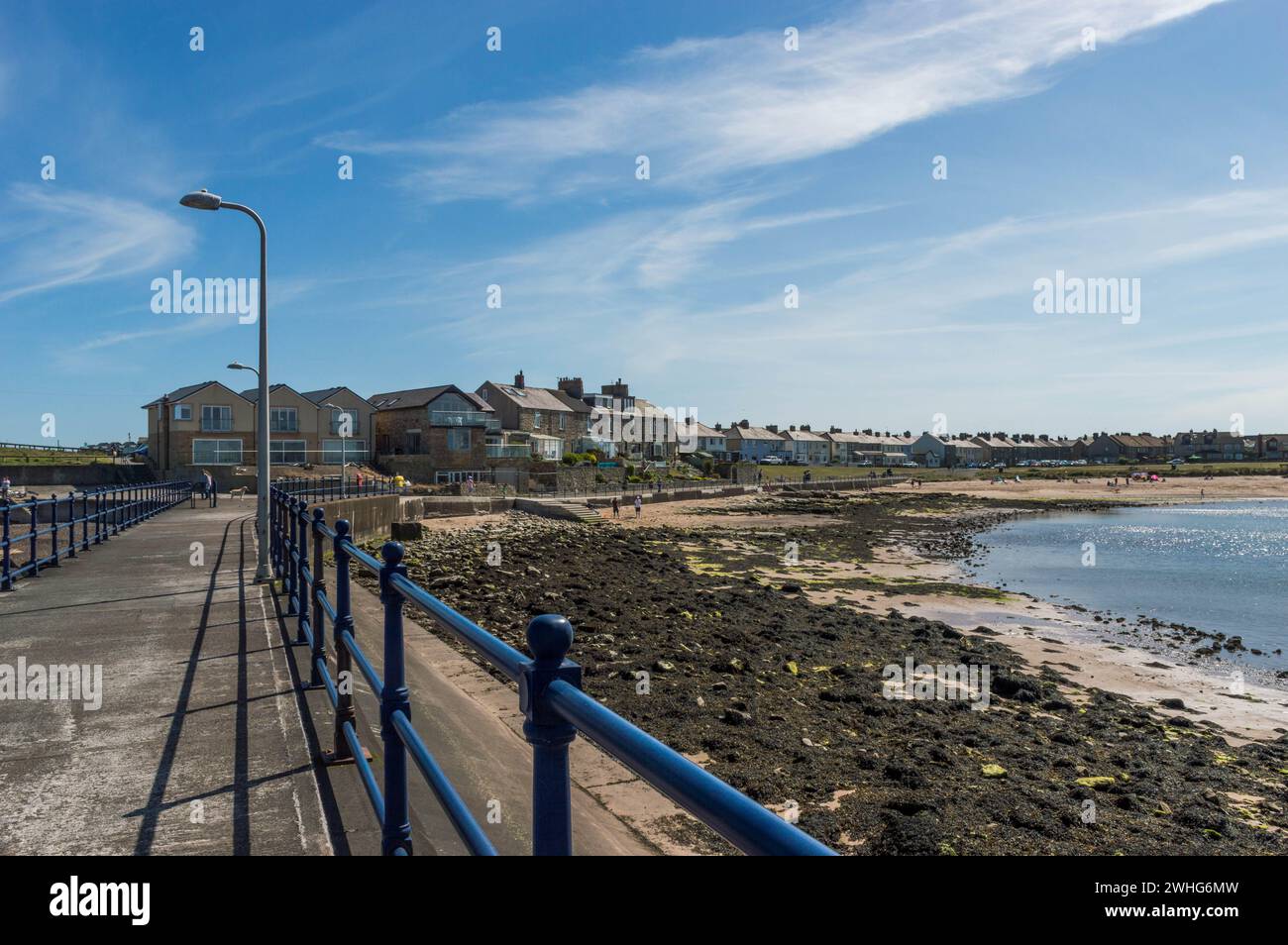 View along the pier to Amble Stock Photo - Alamy