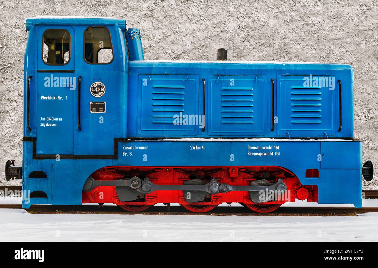 The shunting locomotive in front of the old wall Stock Photo - Alamy
