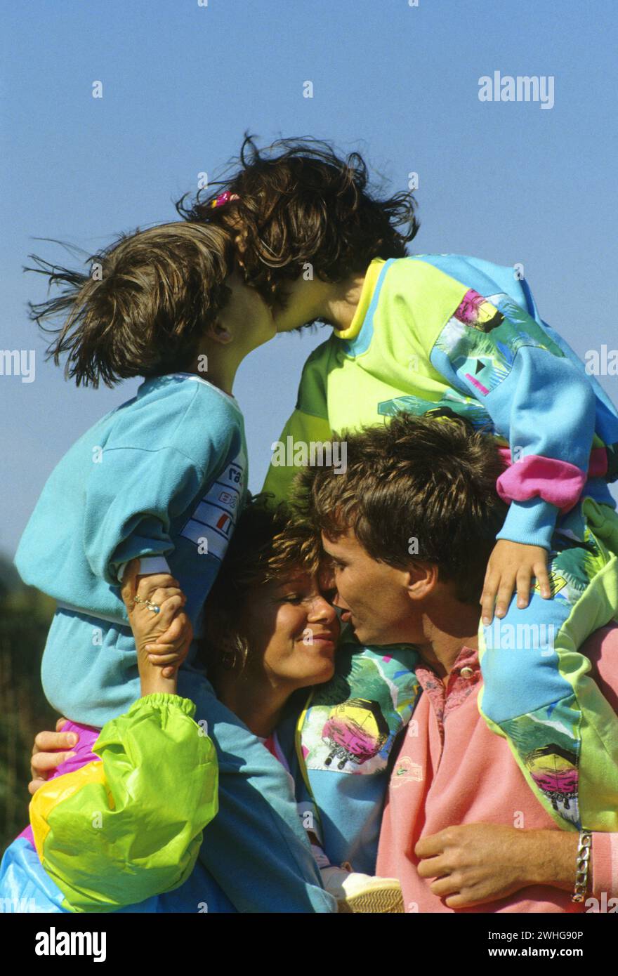 family happy together very happy alltogether colored clothes on natural ...