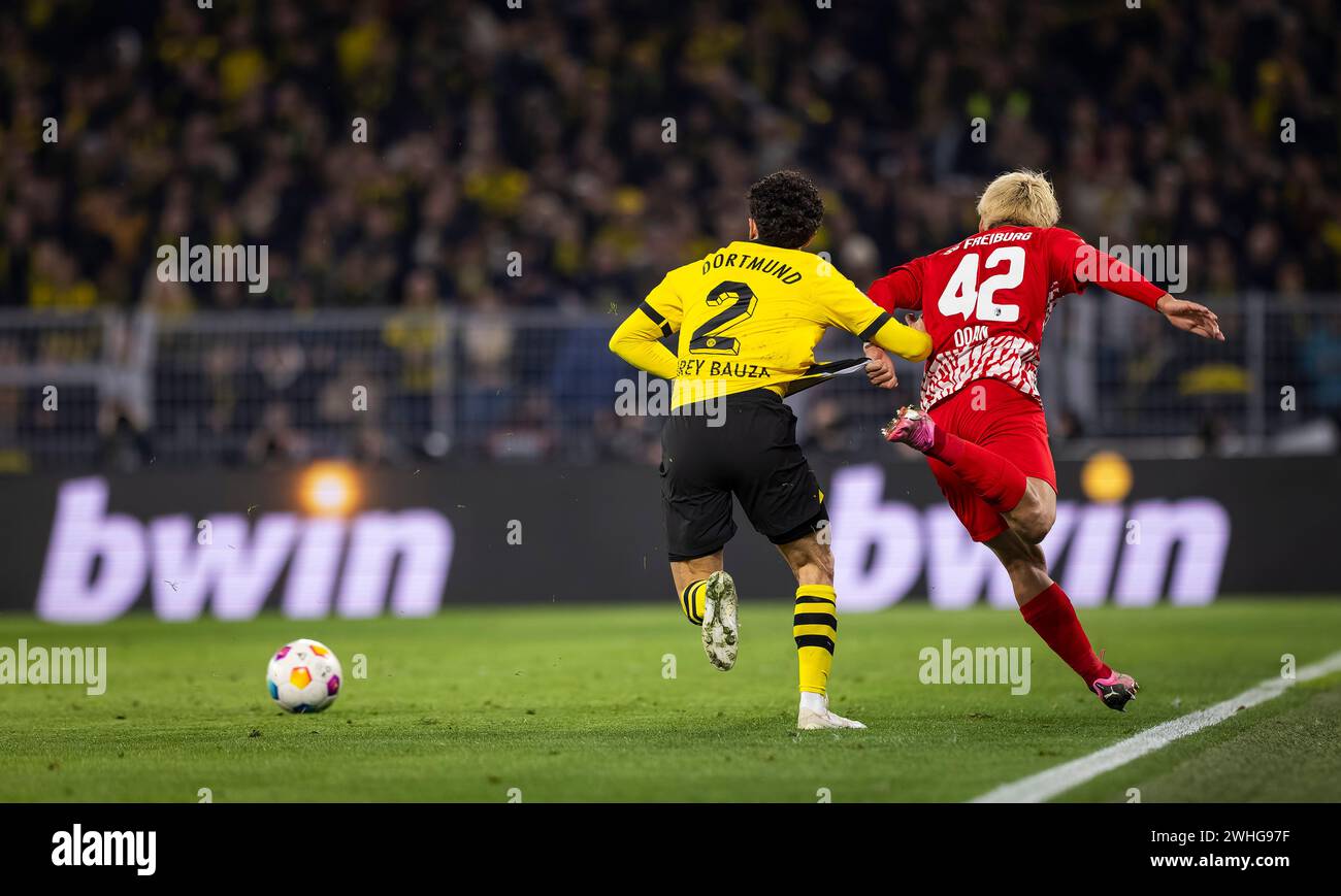 Dortmund, Germany. 09th Feb 2024. Mateu Morey (BVB), Ritsu Doan (SCF ...