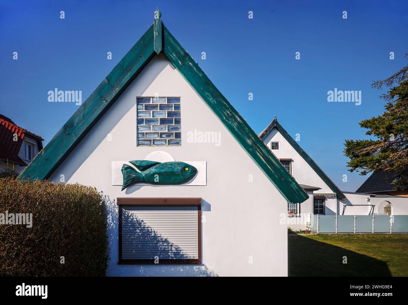 The house facade with the fish Stock Photo - Alamy