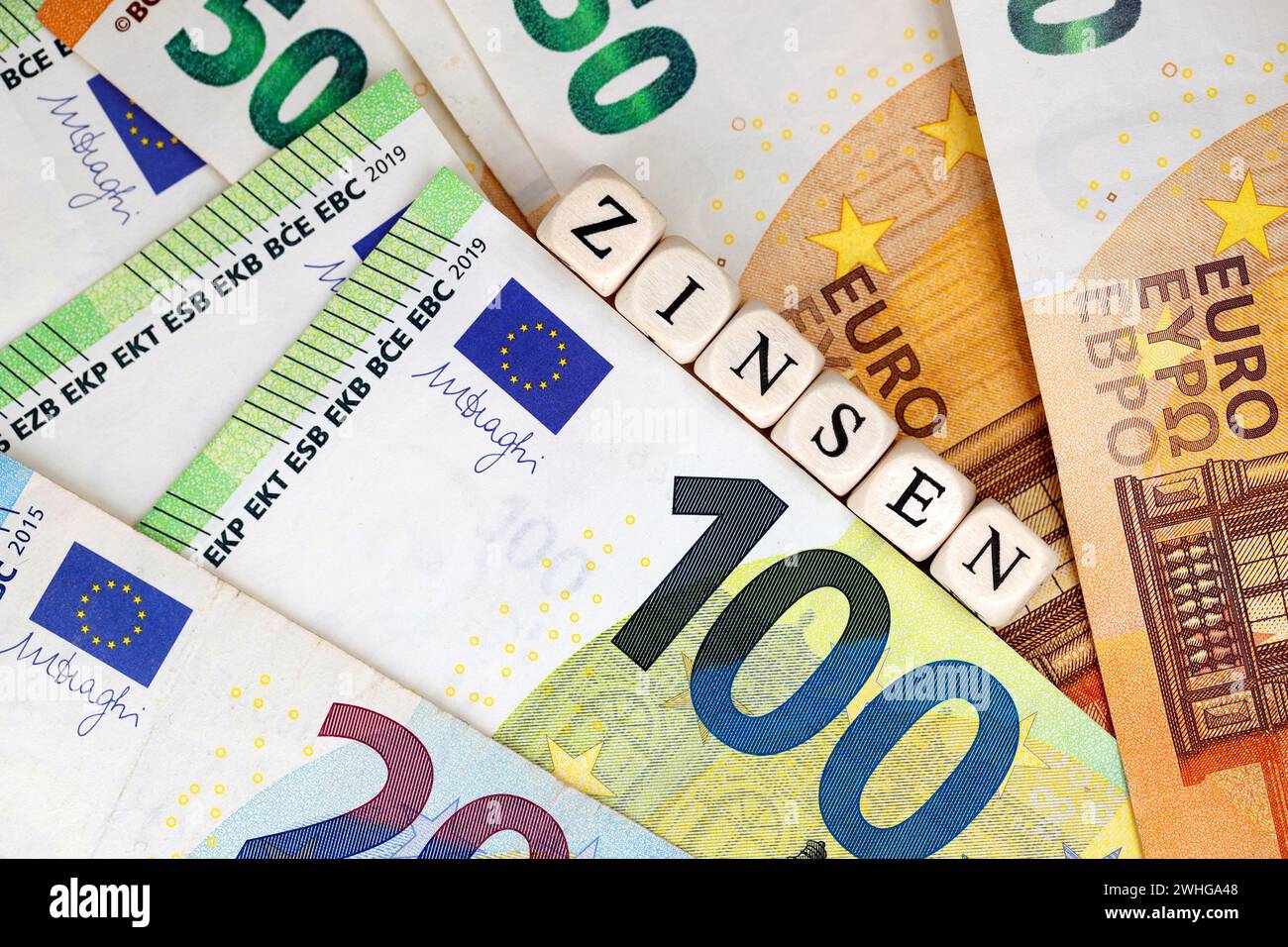 Top view of the German word for interest rates written with wooden ...