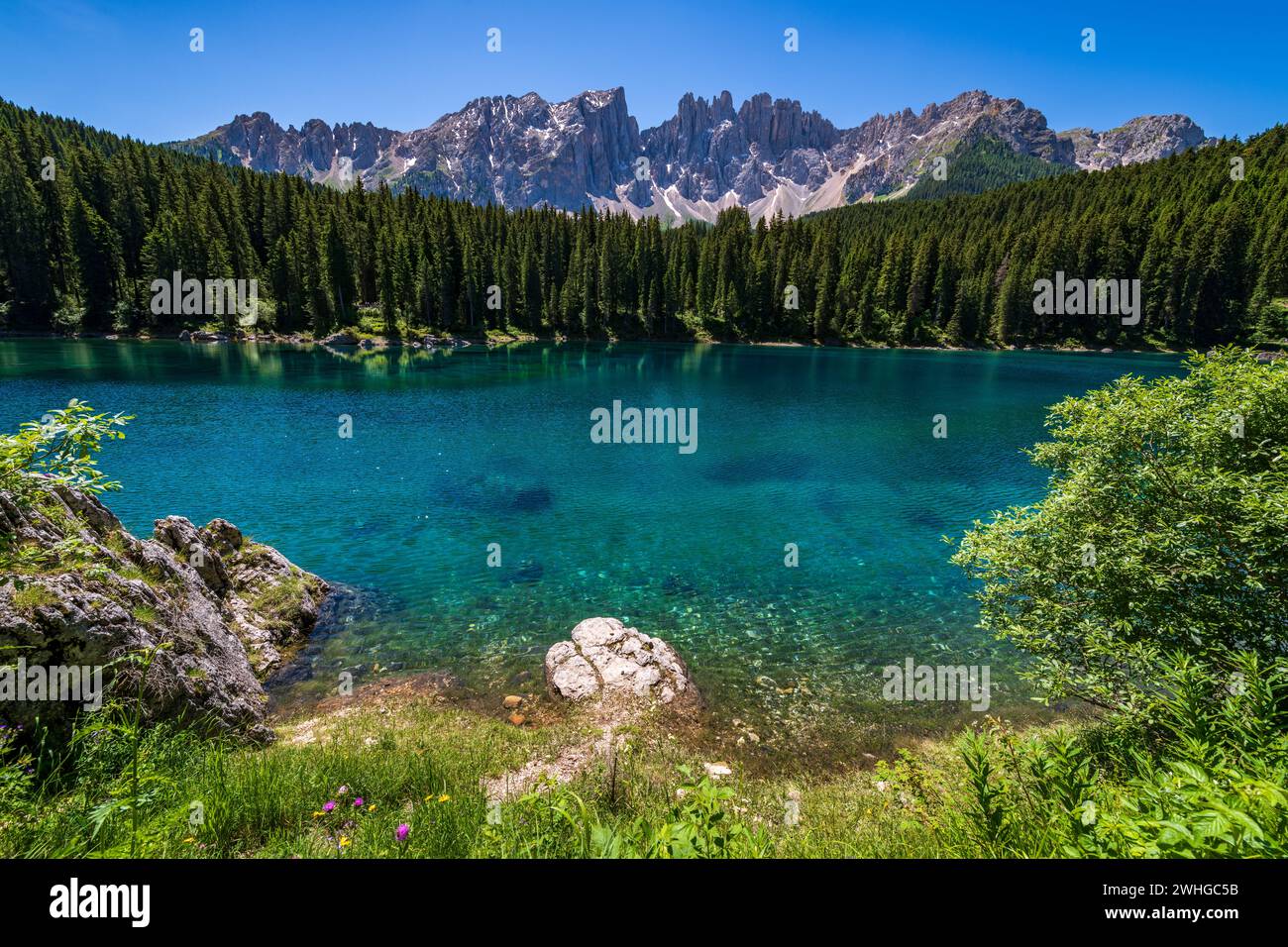 Karersee lake in the Dolomites, South Tyrol, Italy, also known as lake ...