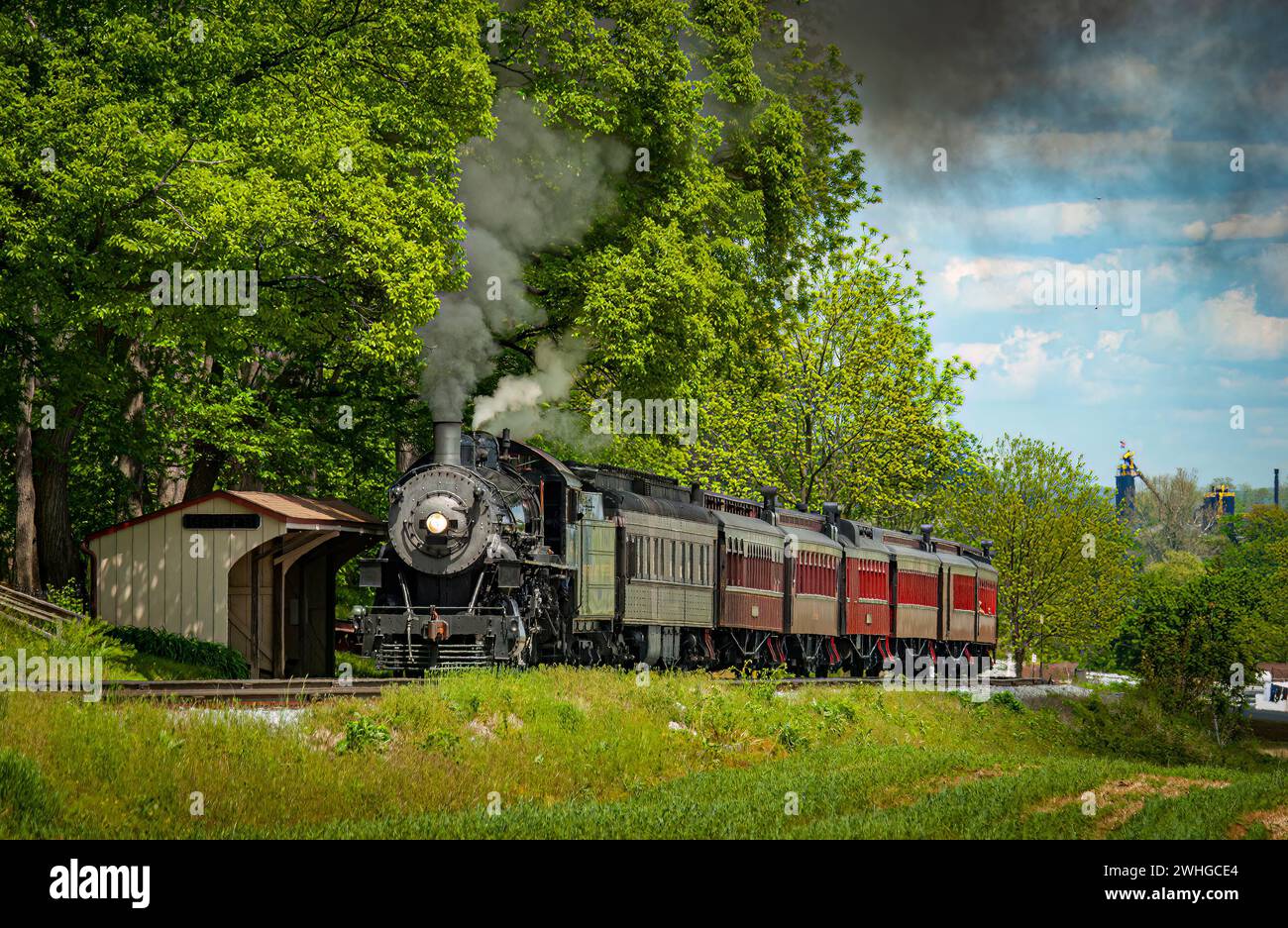 View of an Antique Restored Steam Passenger Train Approaching Along a ...