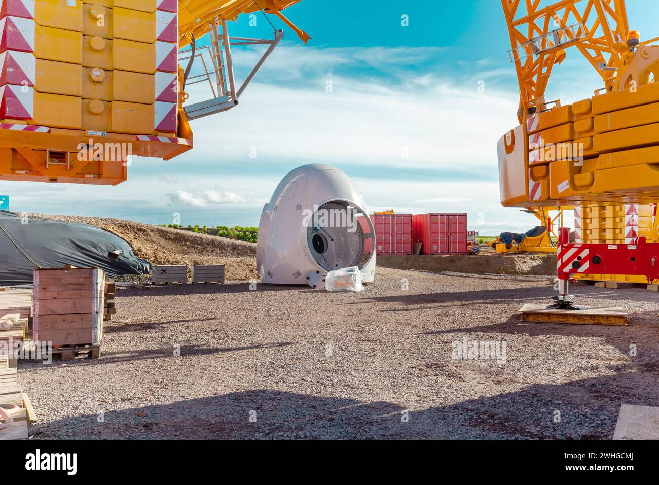 Building and assembling a construction windturbine by crane. Rotor ...