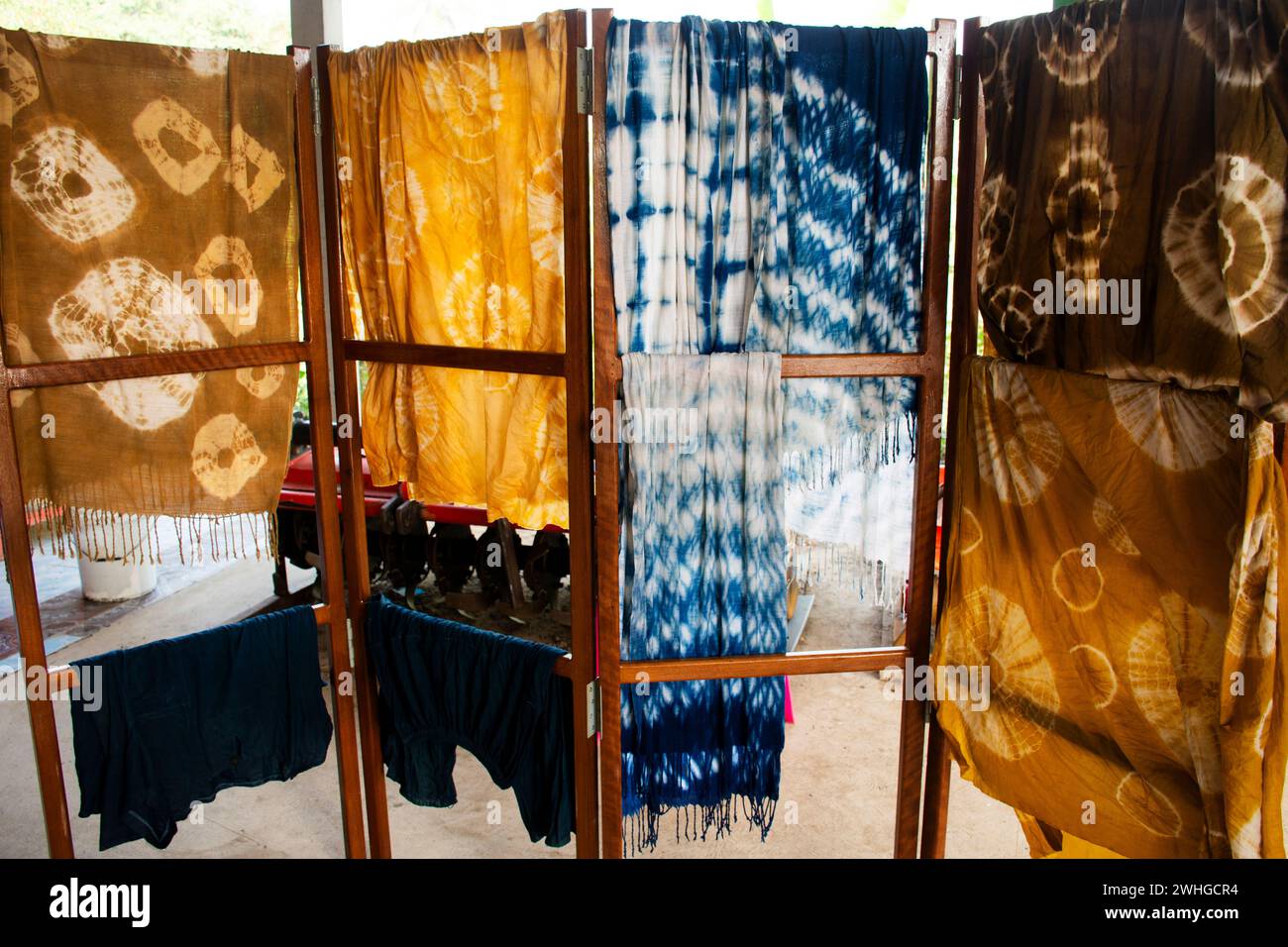 Thai craftsmanship artist working batik ikat tie dye cotton and silk ...