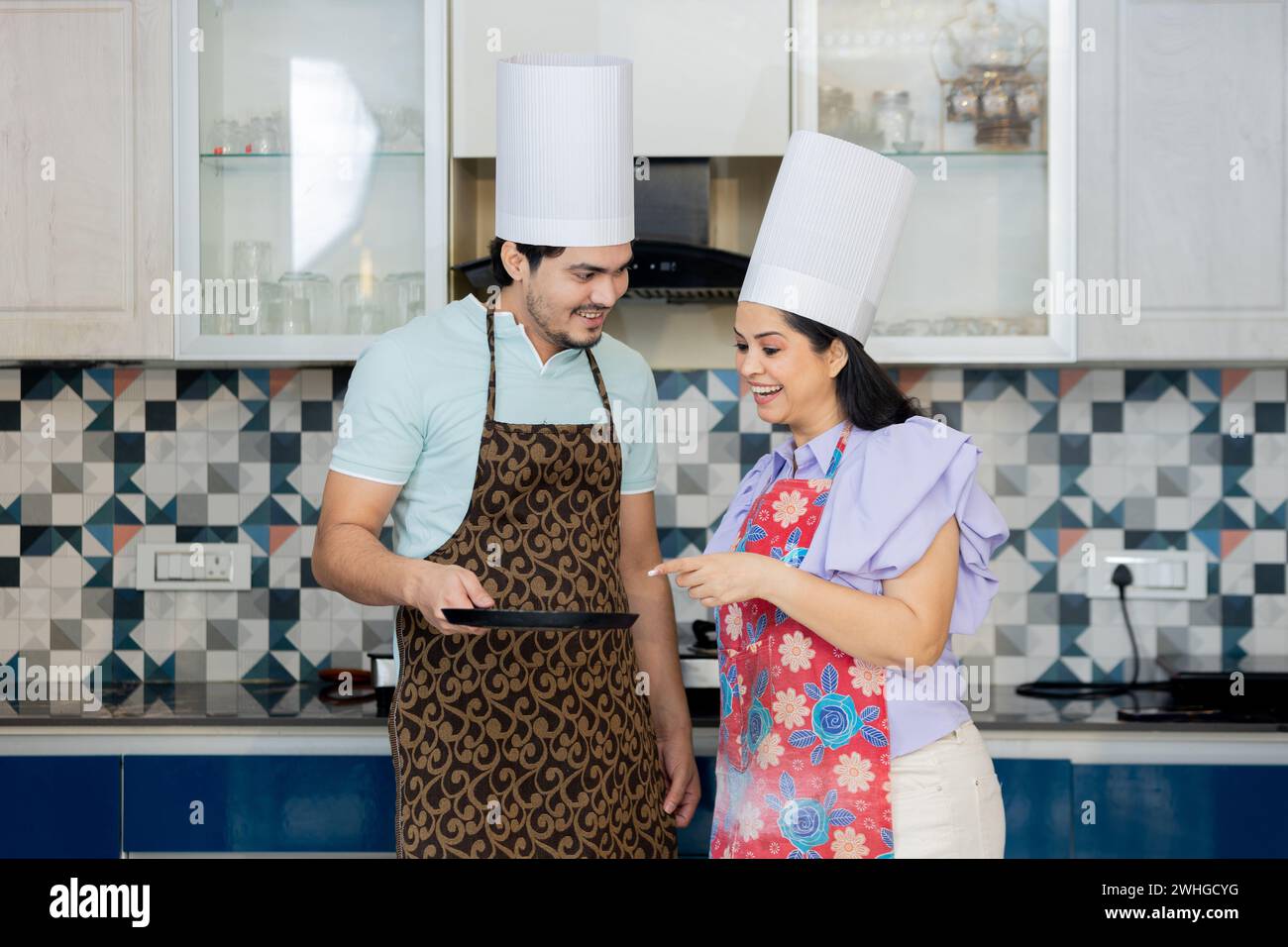 Indian woman chef wearing apron hi-res stock photography and images - Alamy