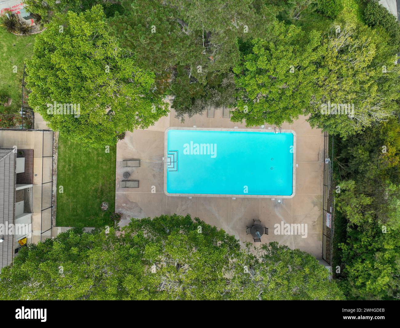 Aerial view of recreational facilities with pool in private residential ...