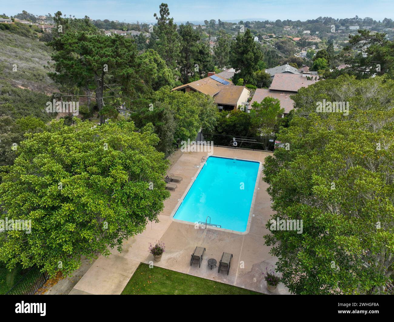Aerial view of recreational facilities with pool in private residential ...