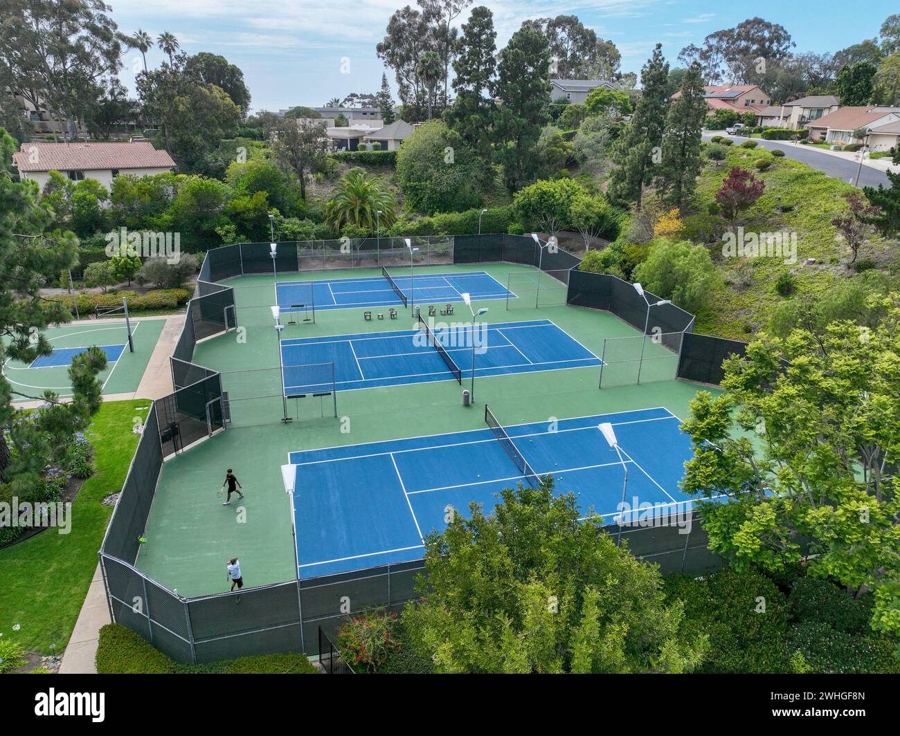 Aerial view of recreational facilities with tennis in private ...