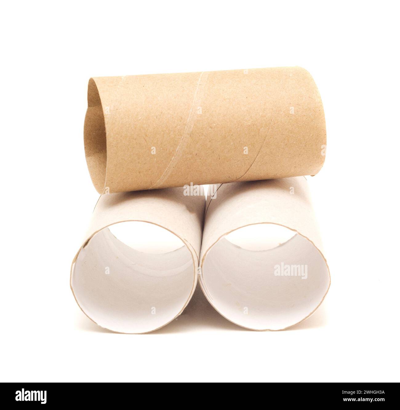 Three empty toilet rolls isolated on white background Stock Photo - Alamy
