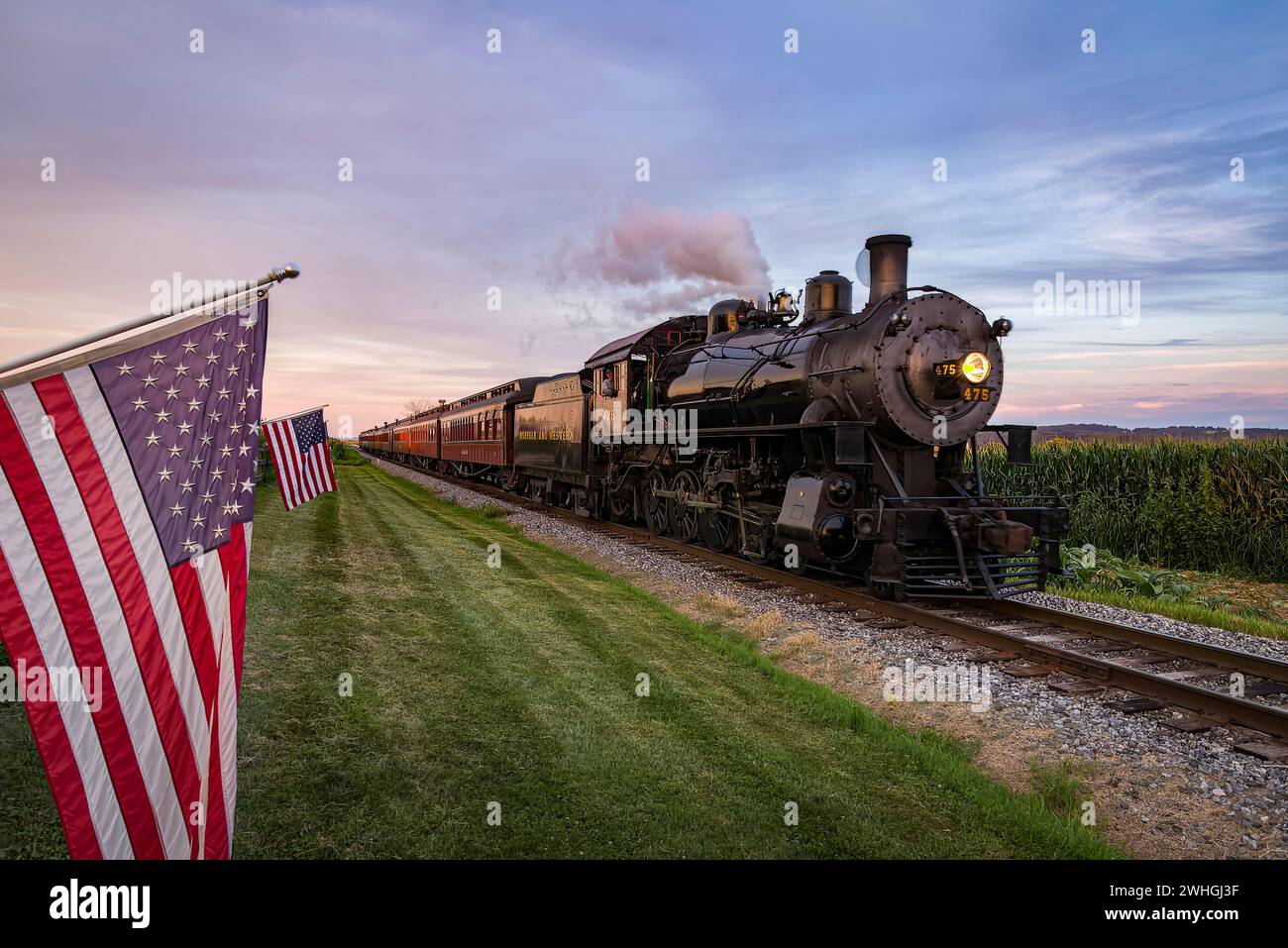 A View of a Classic Steam Passenger Train Approaching, With American ...