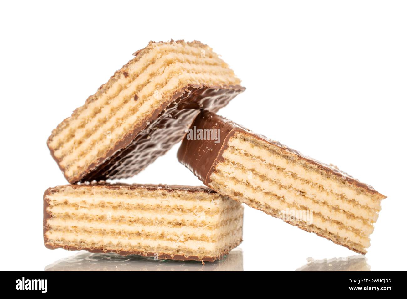 Several sweet chocolate wafers, macro, isolated on white background ...