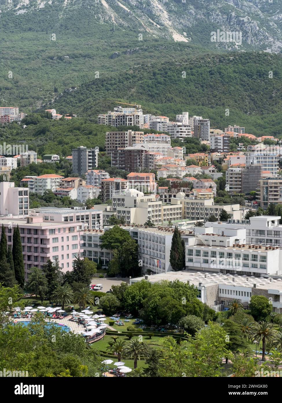 Modern high-rise buildings in Budva at the foot of the mountains Stock ...