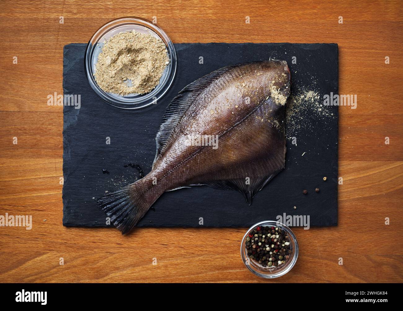 Flounder fish with spices Stock Photo - Alamy