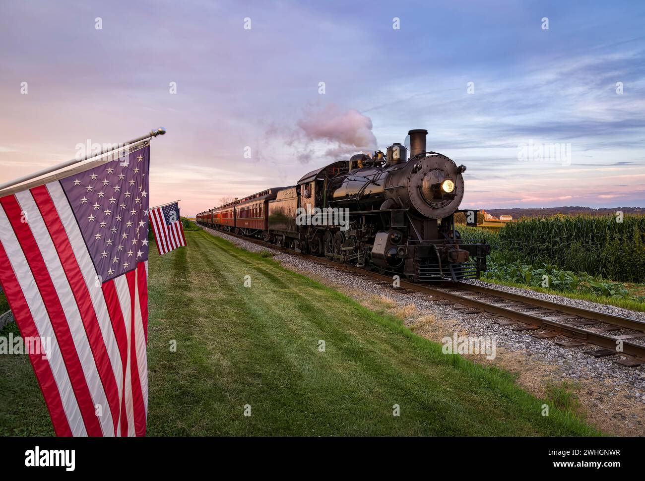 A View of a Classic Steam Passenger Train Approaching, With American ...