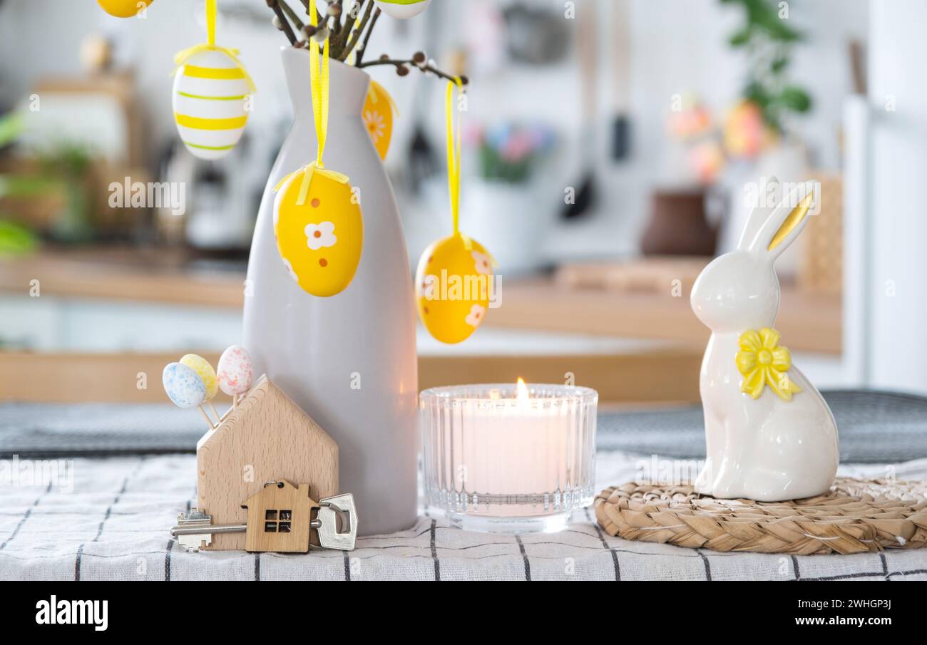 Key to house of cozy home with Easter decor with rabbit and eggs on ...
