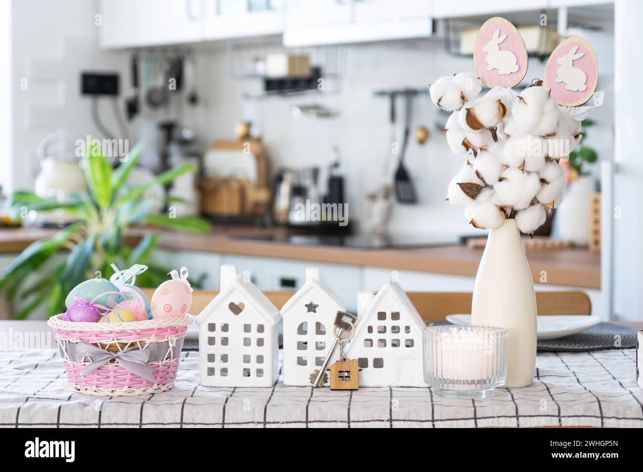 Key to house of cozy home with Easter decor with rabbit and eggs on ...