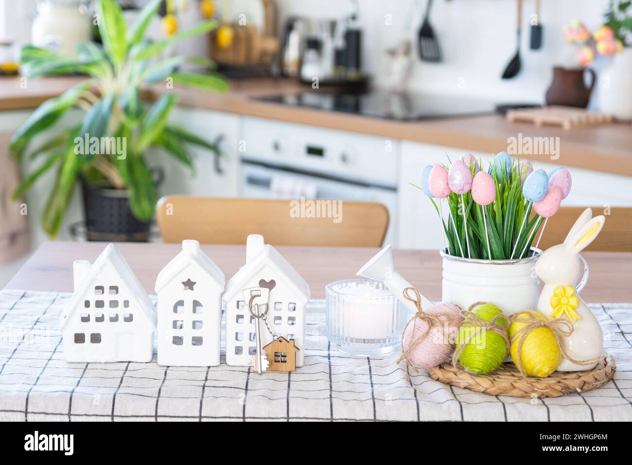 Key to house of cozy home with Easter decor with rabbit and eggs on ...