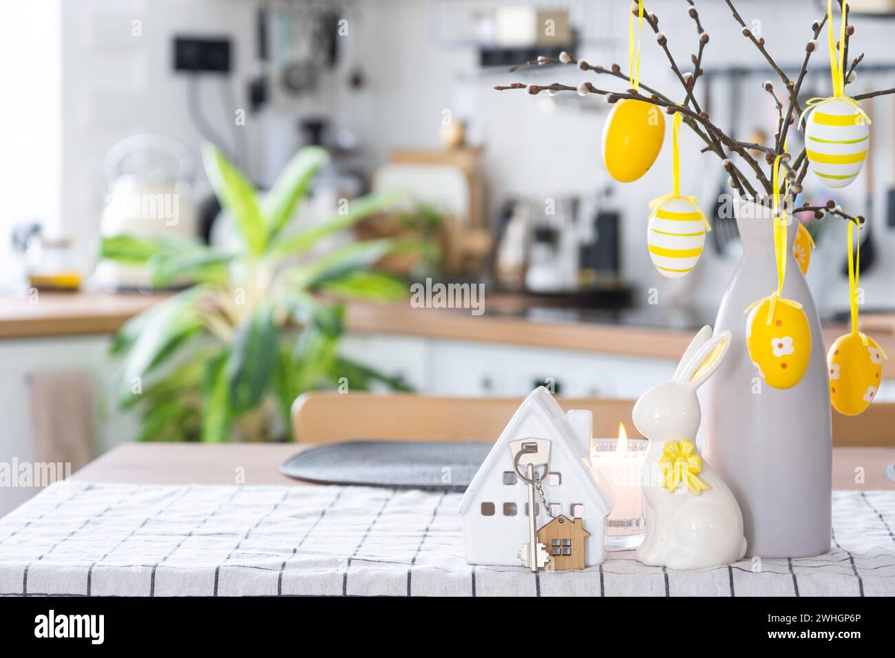Key to house of cozy home with Easter decor with rabbit and eggs on ...