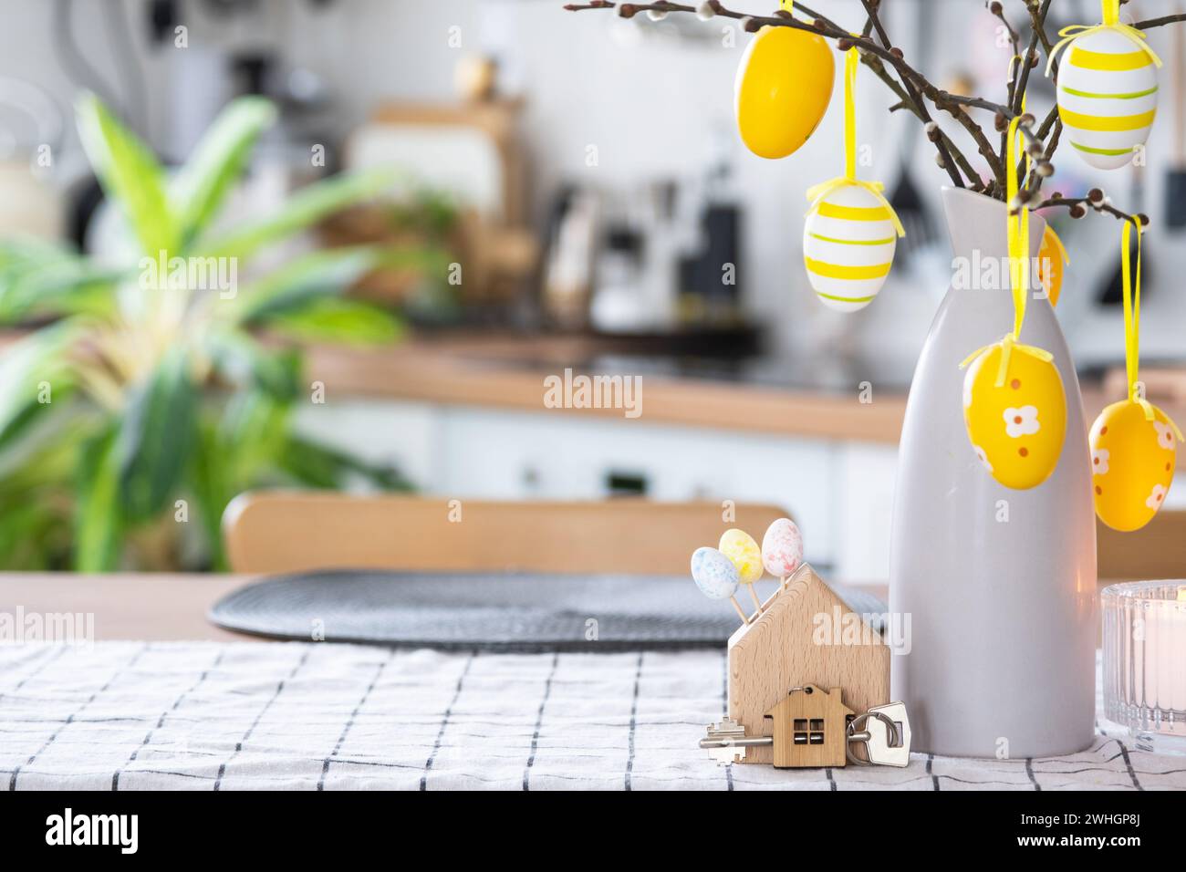 Key to house of cozy home with Easter decor with rabbit and eggs on ...
