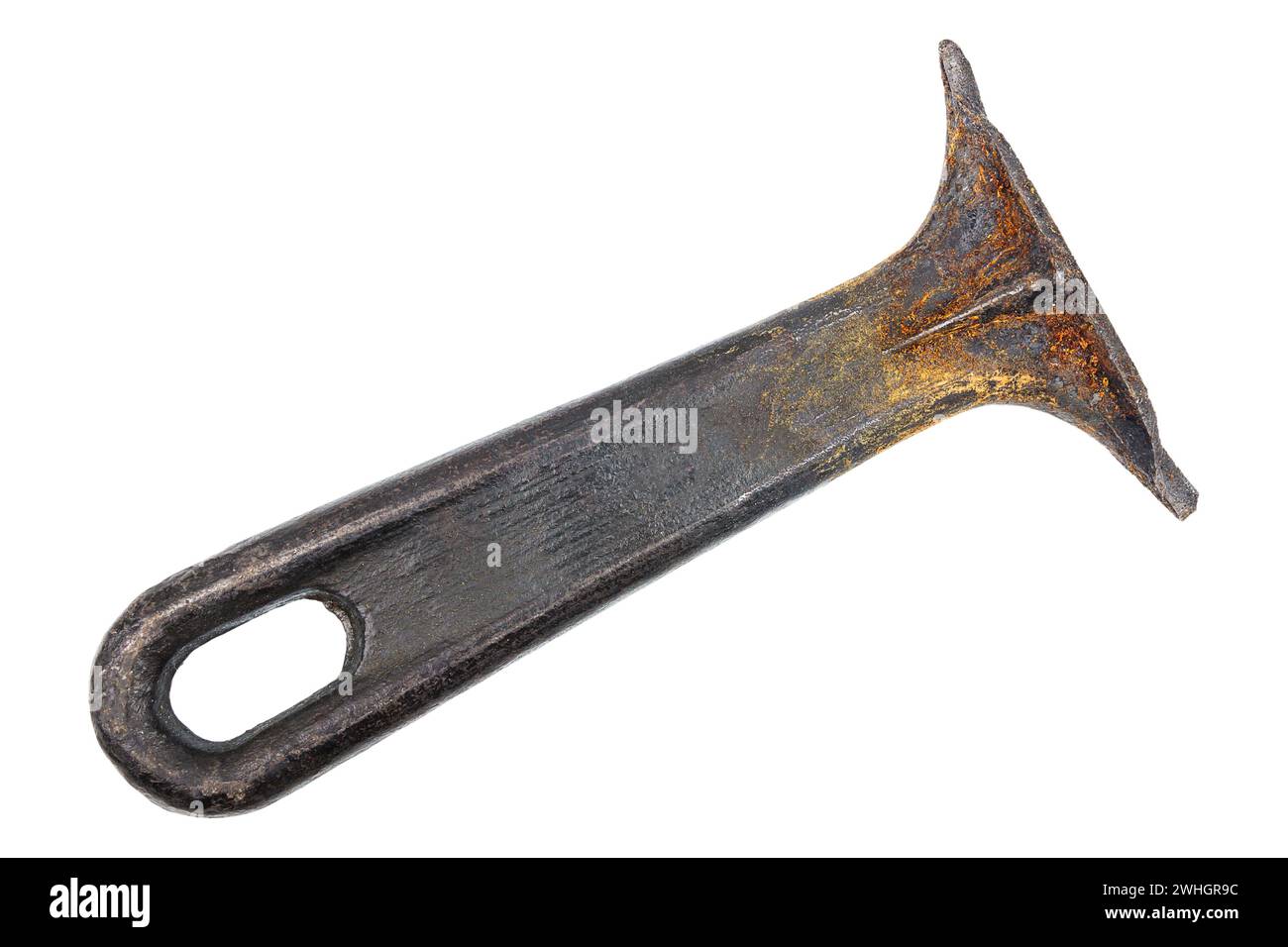 Old grungy black cast iron skillet handle isolated on white background ...
