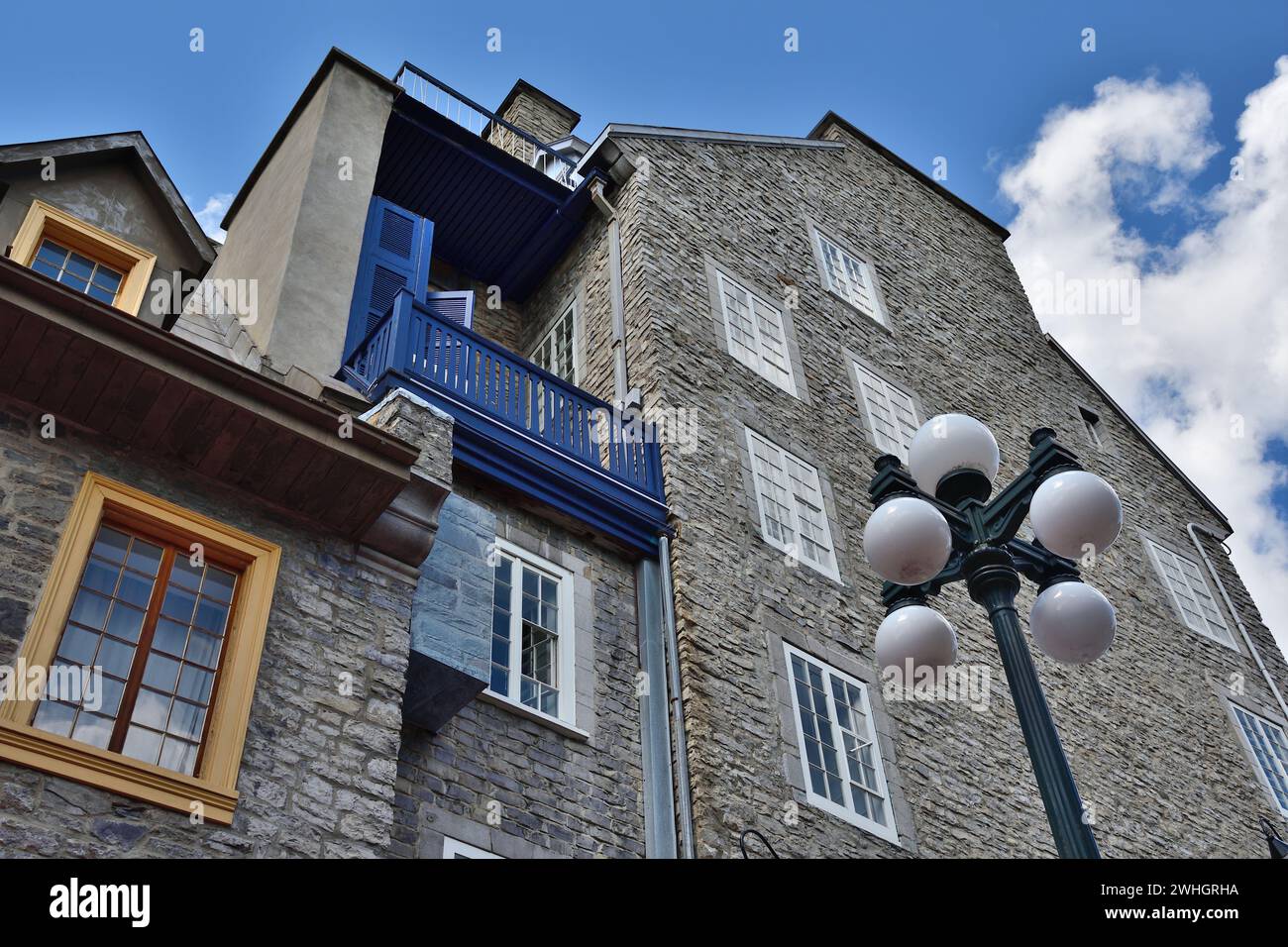 Traditional stone house near breakneck steps in Old Quebec City, Yellow ...
