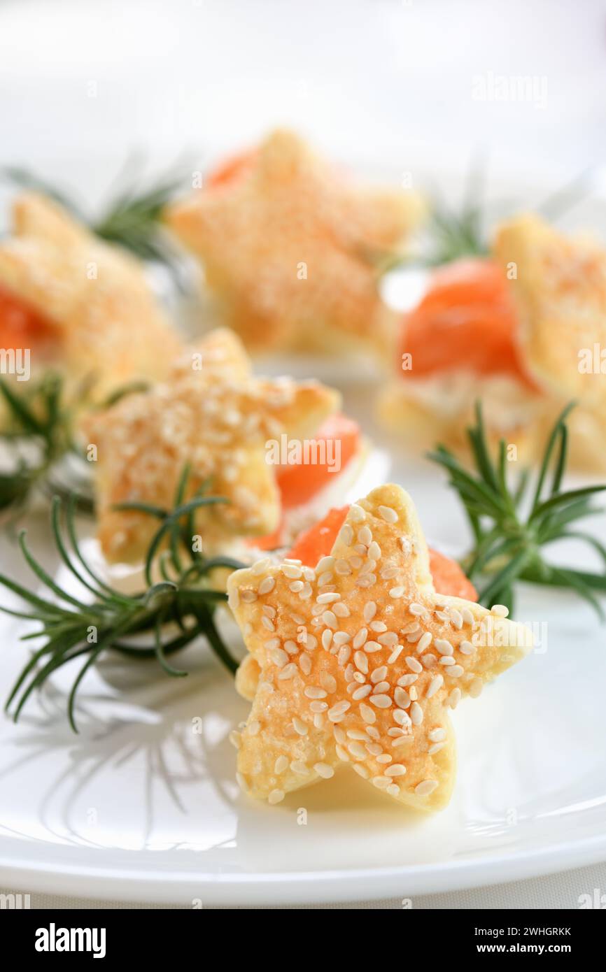 Puff pastry stars with salmon and cheese Stock Photo - Alamy