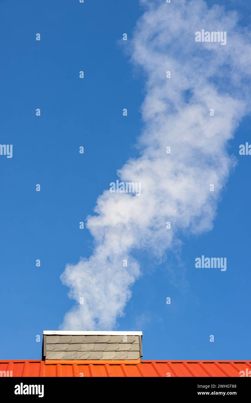 Heating with fossil fuels Smoking chimney Stock Photo - Alamy