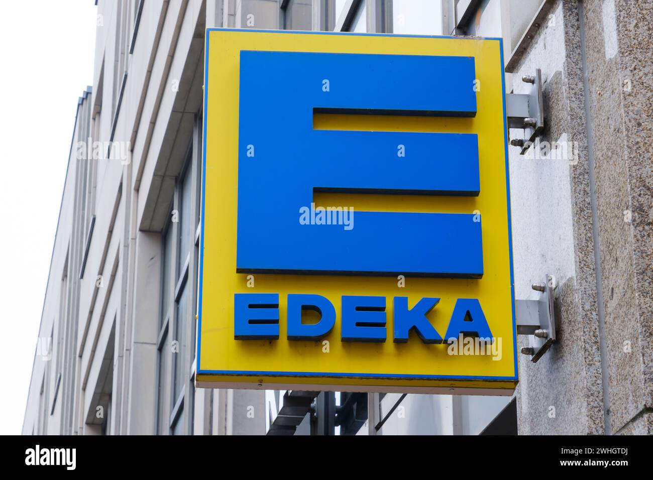 Facade with sing and logo of Edeka Stock Photo - Alamy