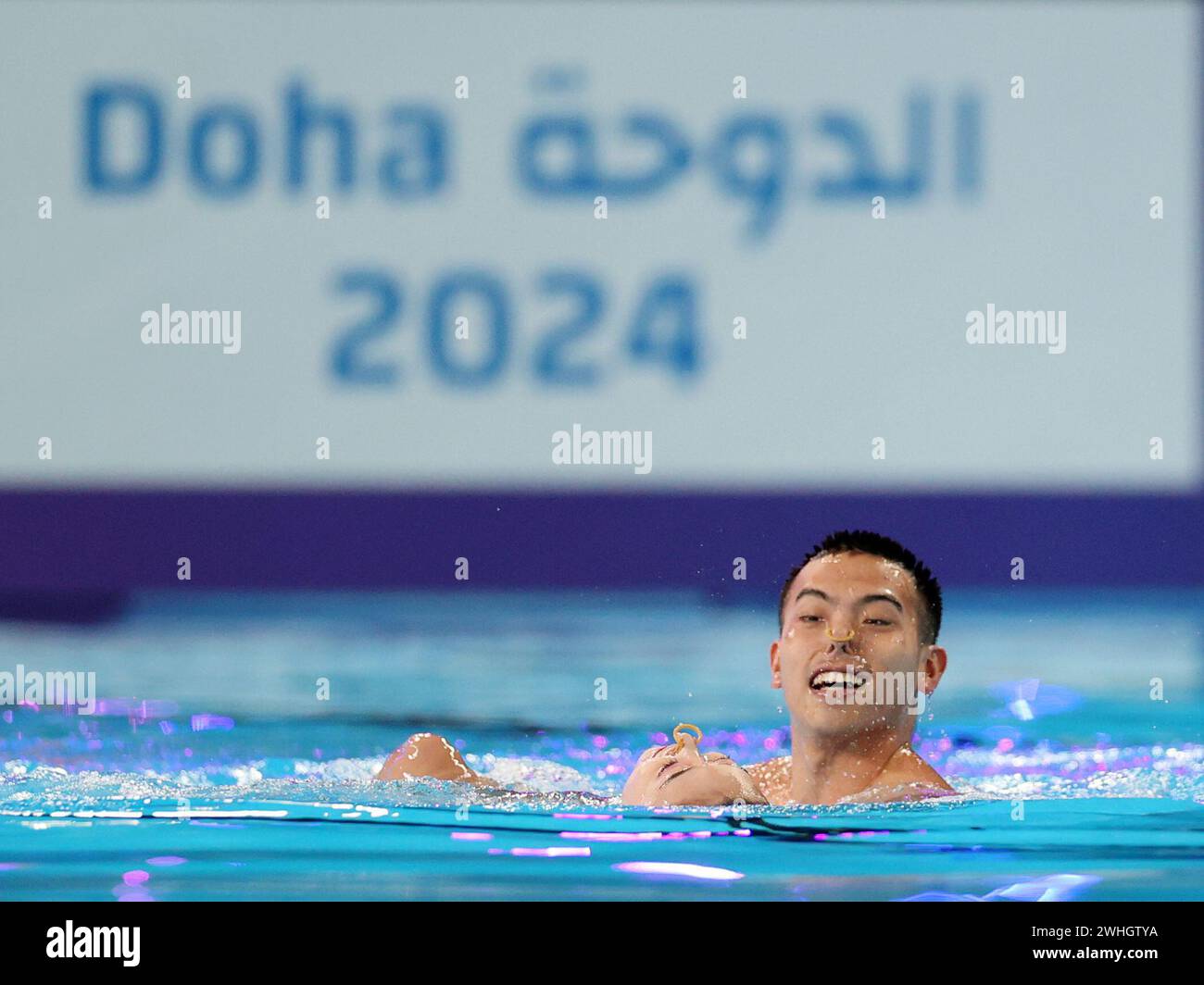 Doha, Qatar. 10th Feb, 2024. Cheng Wentao/Shi Haoyu (R) of China ...