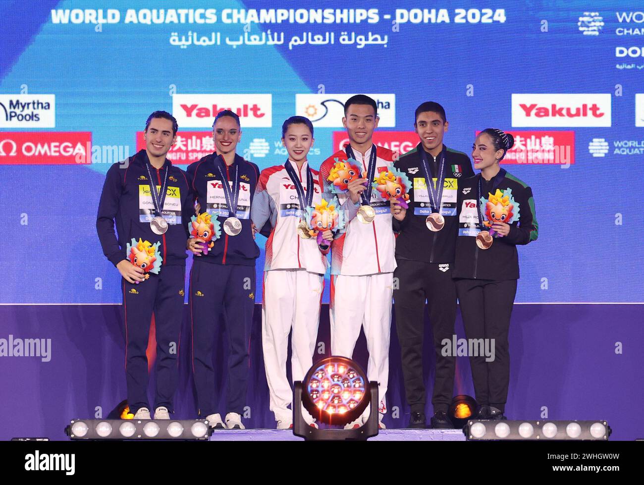 Doha, Qatar. 10th Feb, 2024. Gold medalists Cheng Wentao (3rd, L)/Shi Haoyu (3rd, R) of China ...