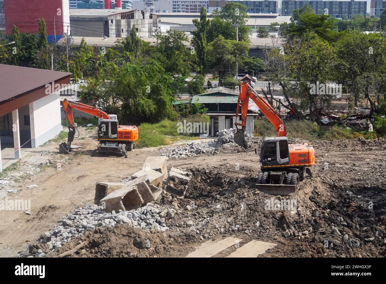 Excavator bucket breaks old house hi-res stock photography and images ...