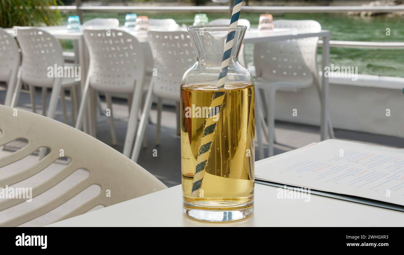 Glass vessel with drink Stock Photo - Alamy