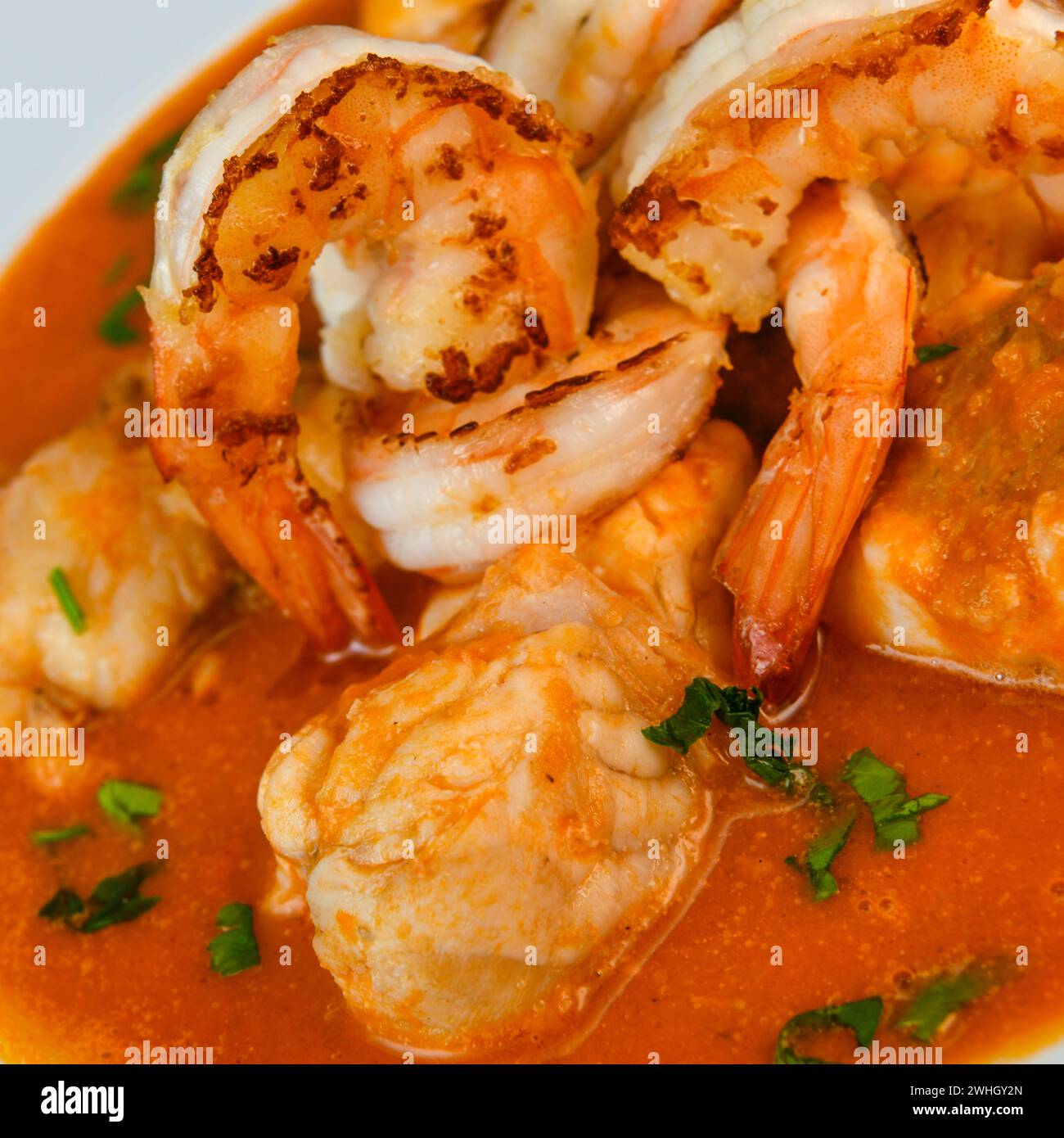 Recipe for Armorican-style monkfish tail, prawns, flambees with cognac ...
