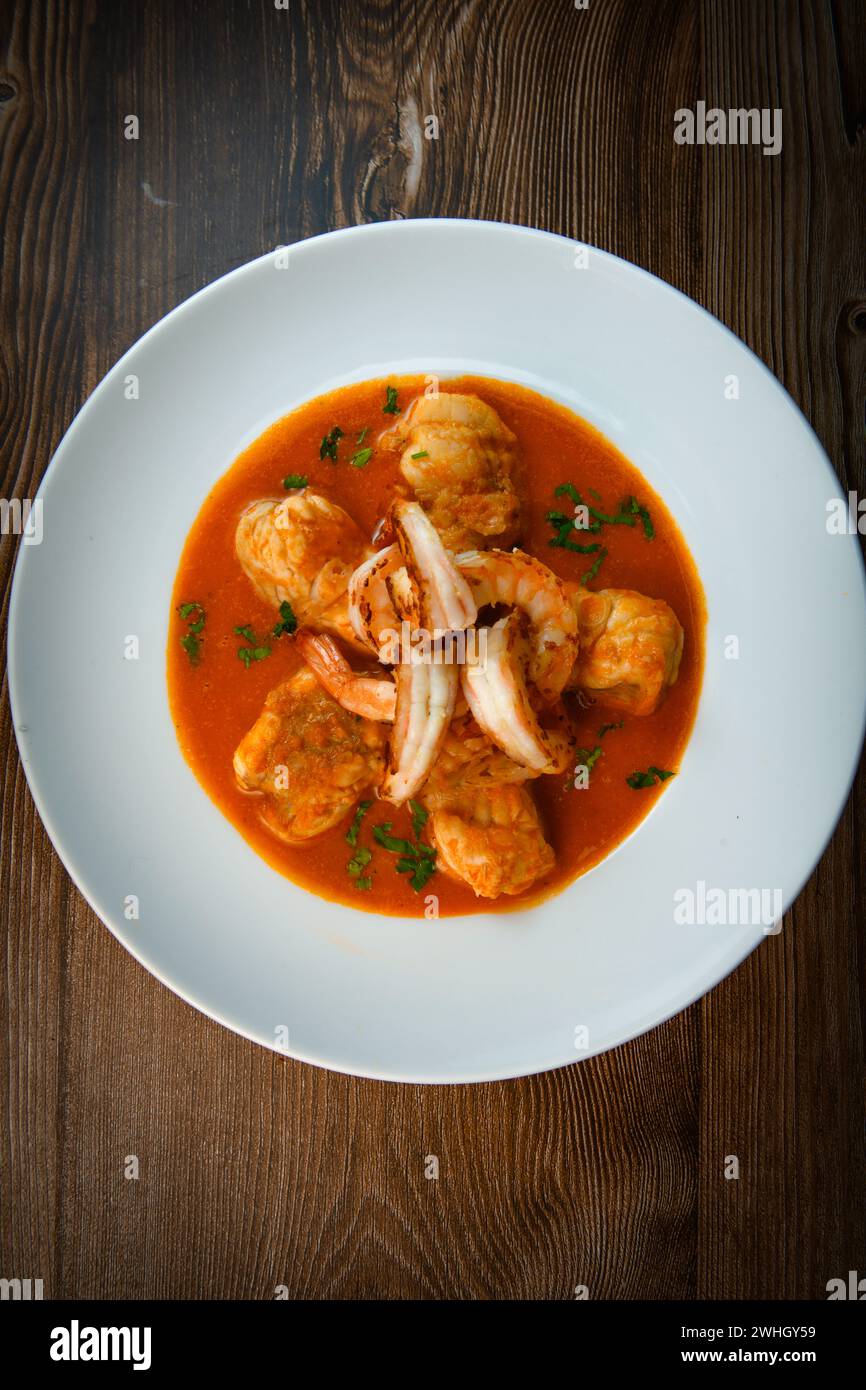 Recipe for Armorican-style monkfish tail, prawns, flambees with cognac ...