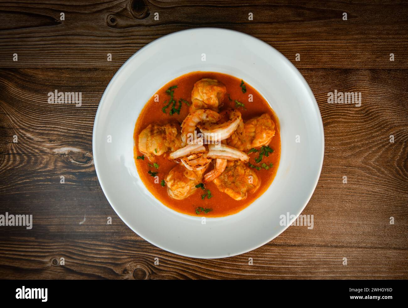 Recipe for Armorican-style monkfish tail, prawns, flambees with cognac ...