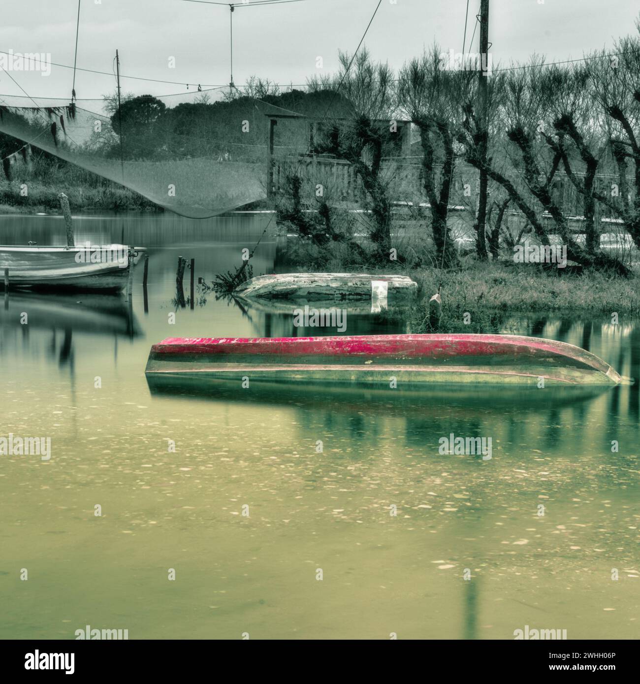 Old, broken Italian boats (Ravenna Stock Photo - Alamy