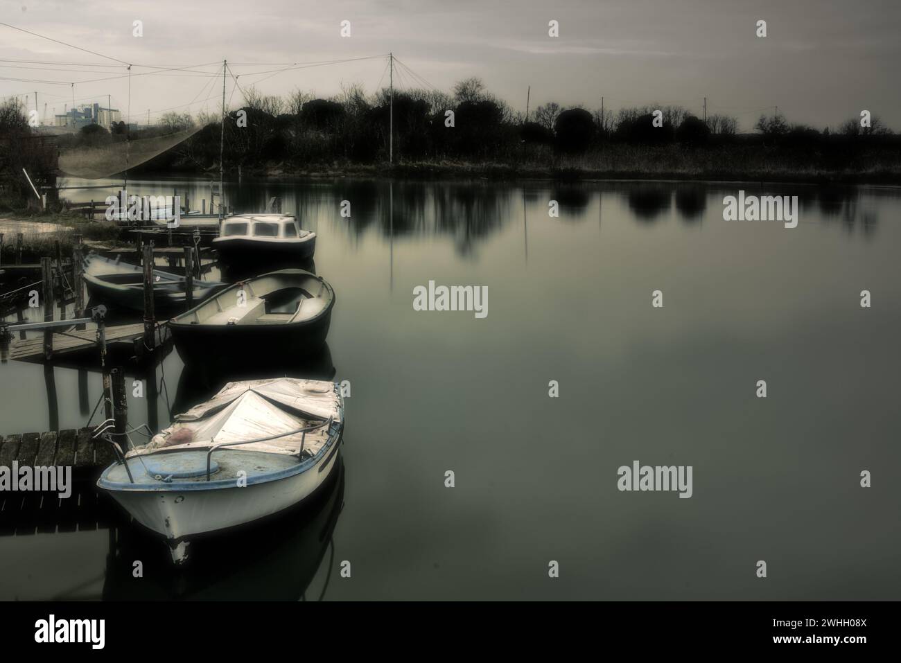 Old, broken Italian boats (Ravenna Stock Photo - Alamy