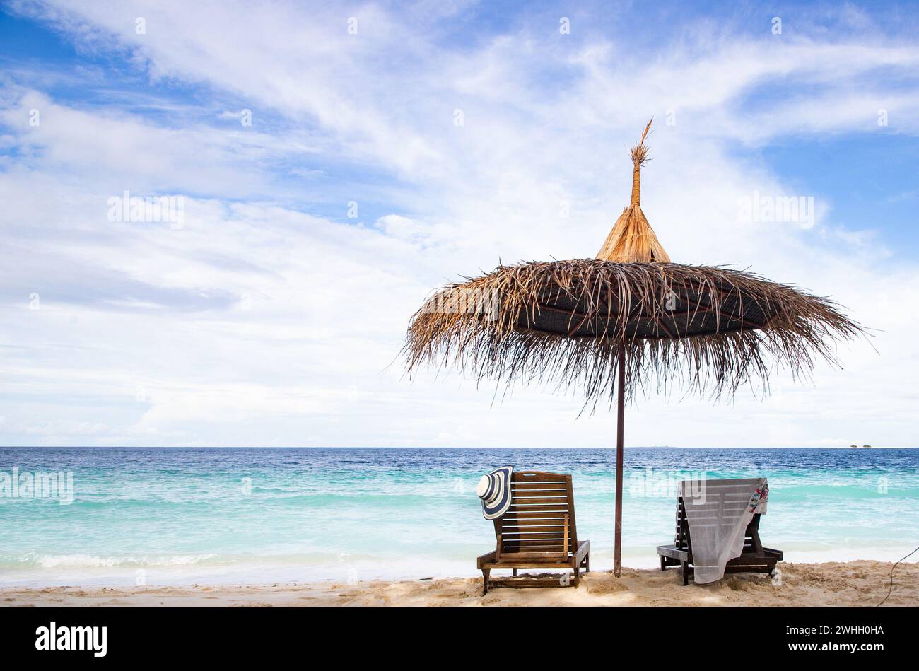 Amazing tropical beach chairs umbrella hi-res stock photography and ...