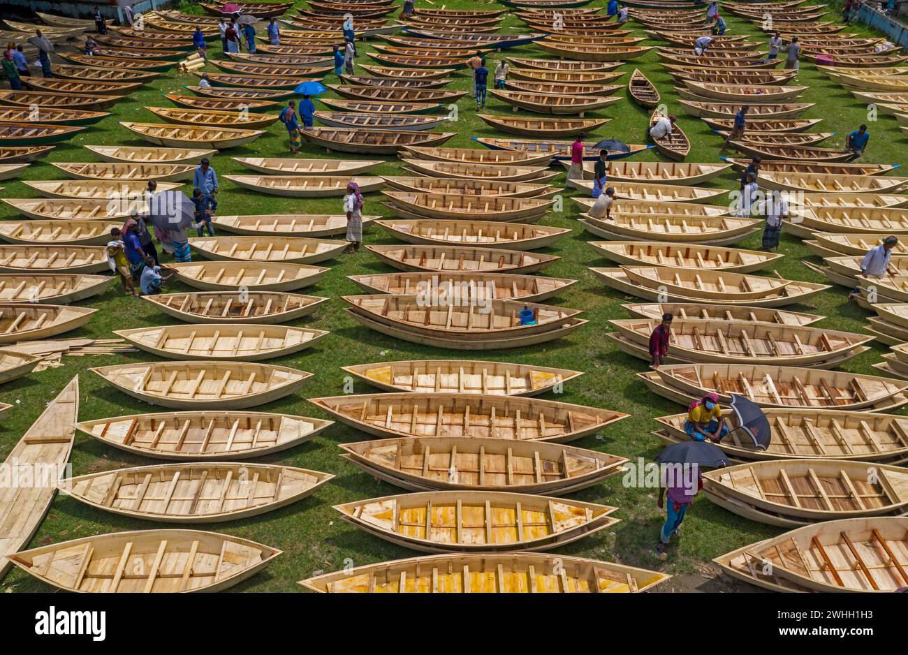 Aerial view of hundreds of small wooden boats are lined up for sale at ...