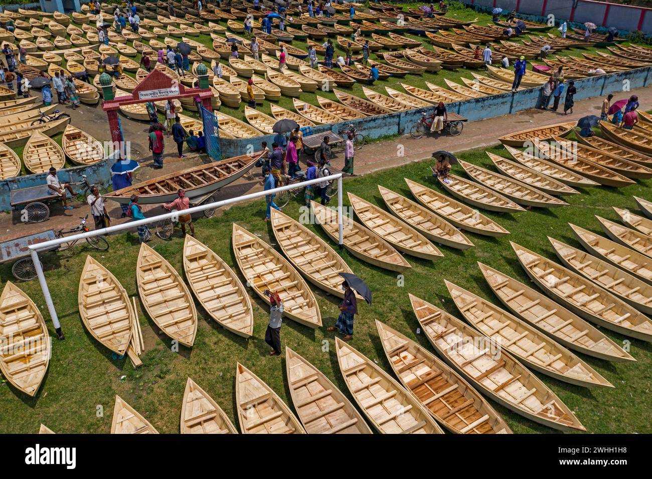 Aerial view of hundreds of small wooden boats are lined up for sale at ...