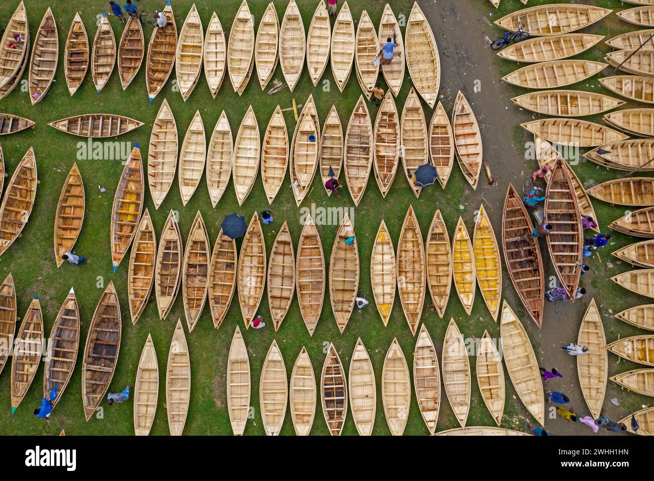 Aerial view of hundreds of small wooden boats are lined up for sale at ...