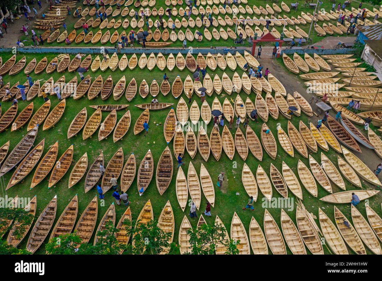 Aerial view of hundreds of small wooden boats are lined up for sale at ...