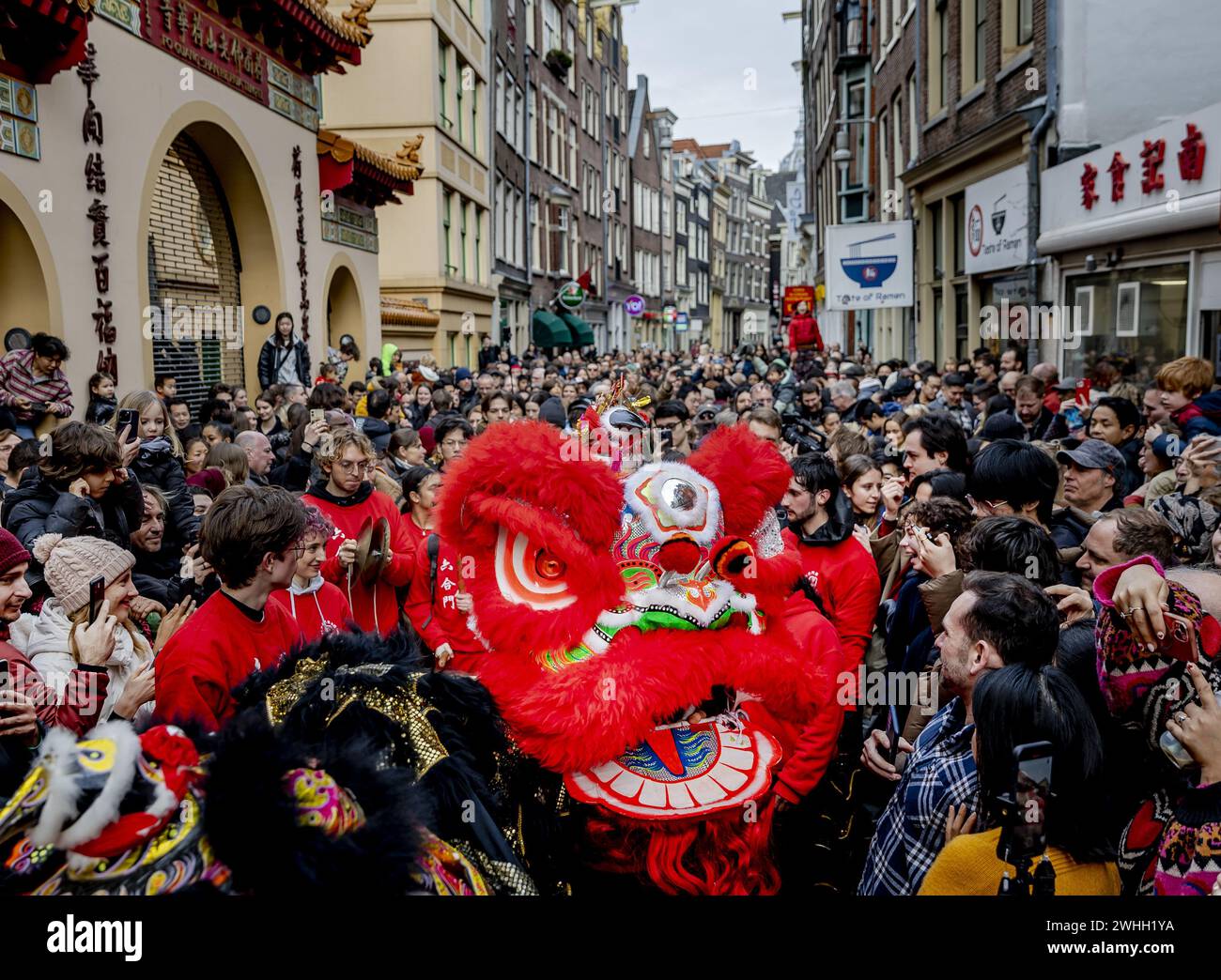 AMSTERDAM - Traditional lions and dragons during the celebration of the ...