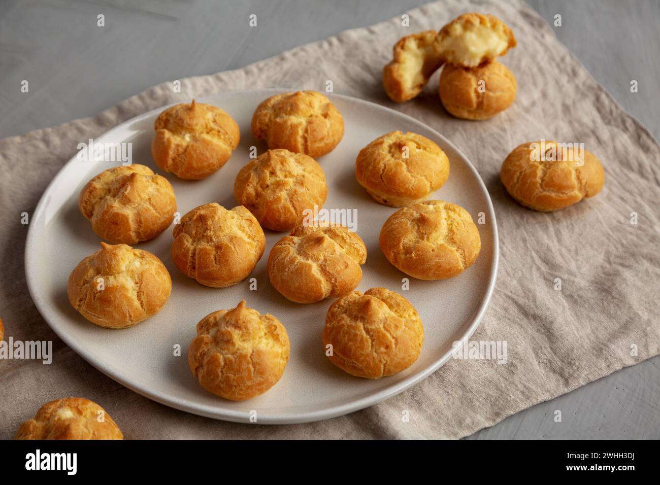 Homemade Mini Cream Puffs on a Plate, side view Stock Photo - Alamy