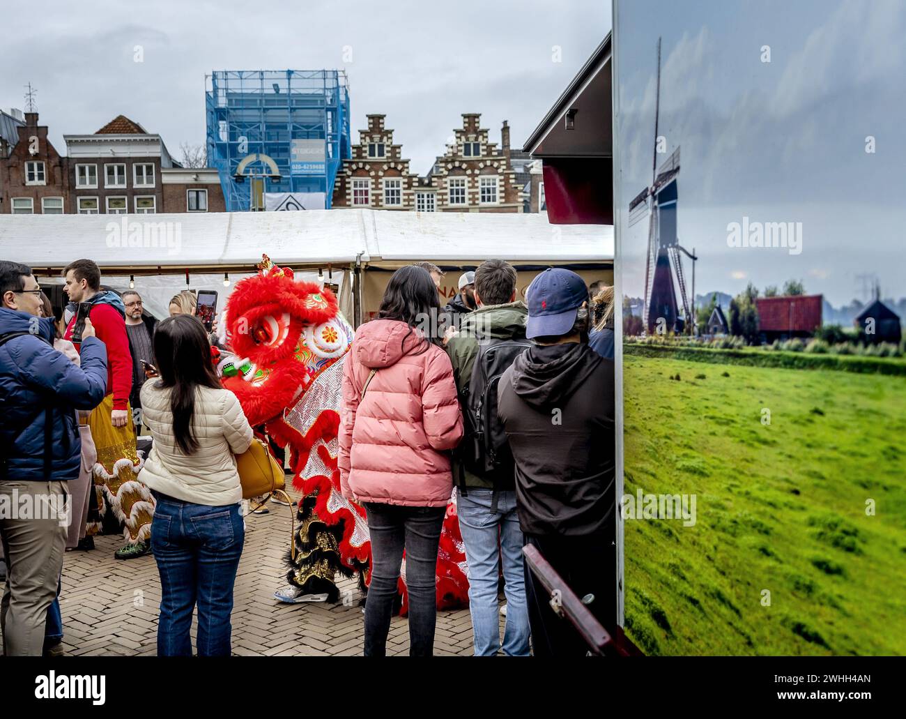 AMSTERDAM - Traditional lions and dragons during the celebration of the ...