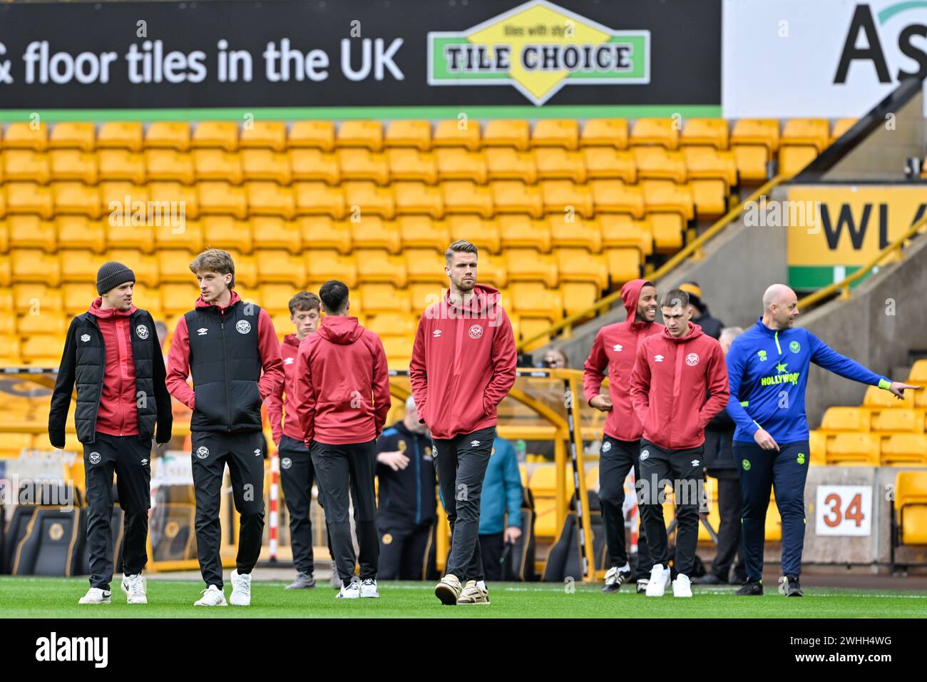 Wolverhampton, UK. 10th Feb, 2024. Brentford squad inspects the pitch ...